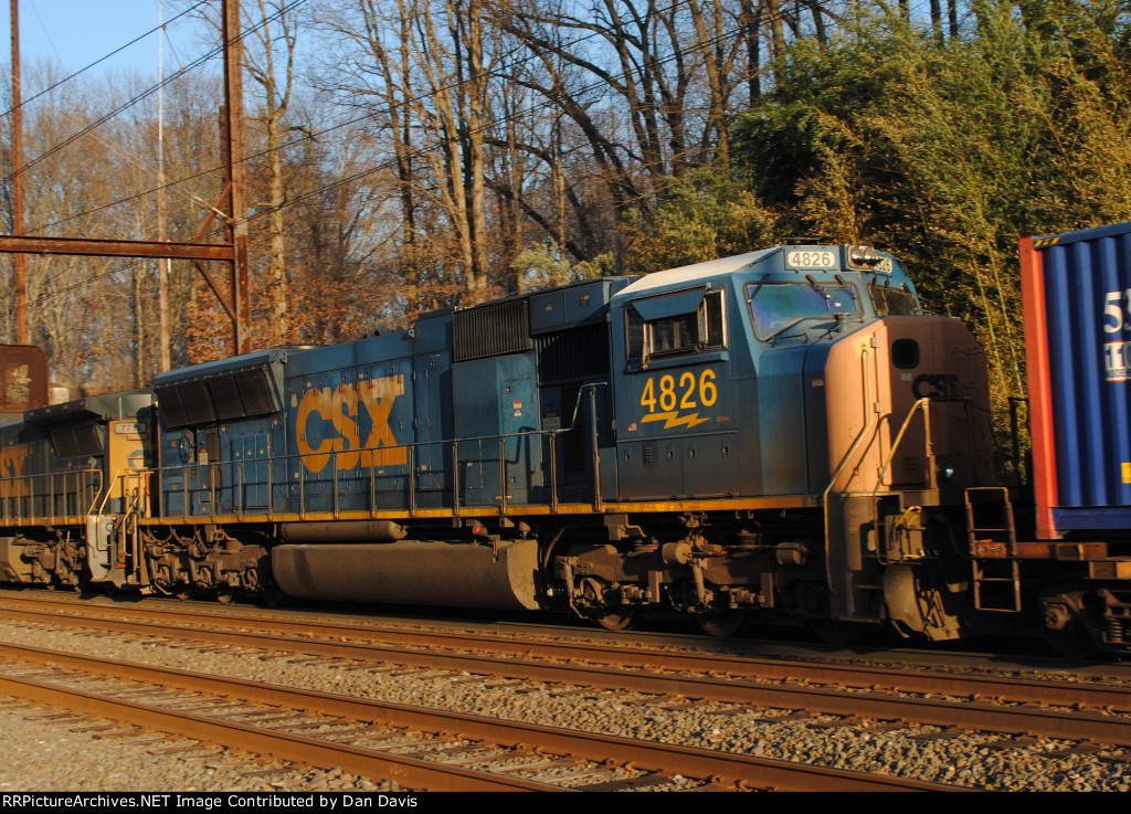CSX SD70AC 4826 trails on Q034-27